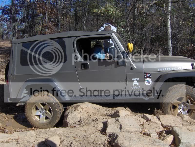 looking for a pic of LJ with 4" lift and stock tires..I know its sad ...